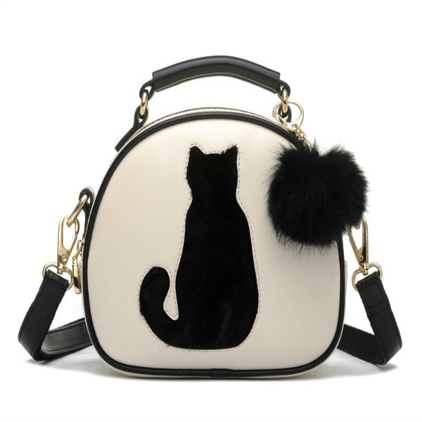 Cute and Adorable Cat Imprinted Leather Handbag With Fur Ball For Women